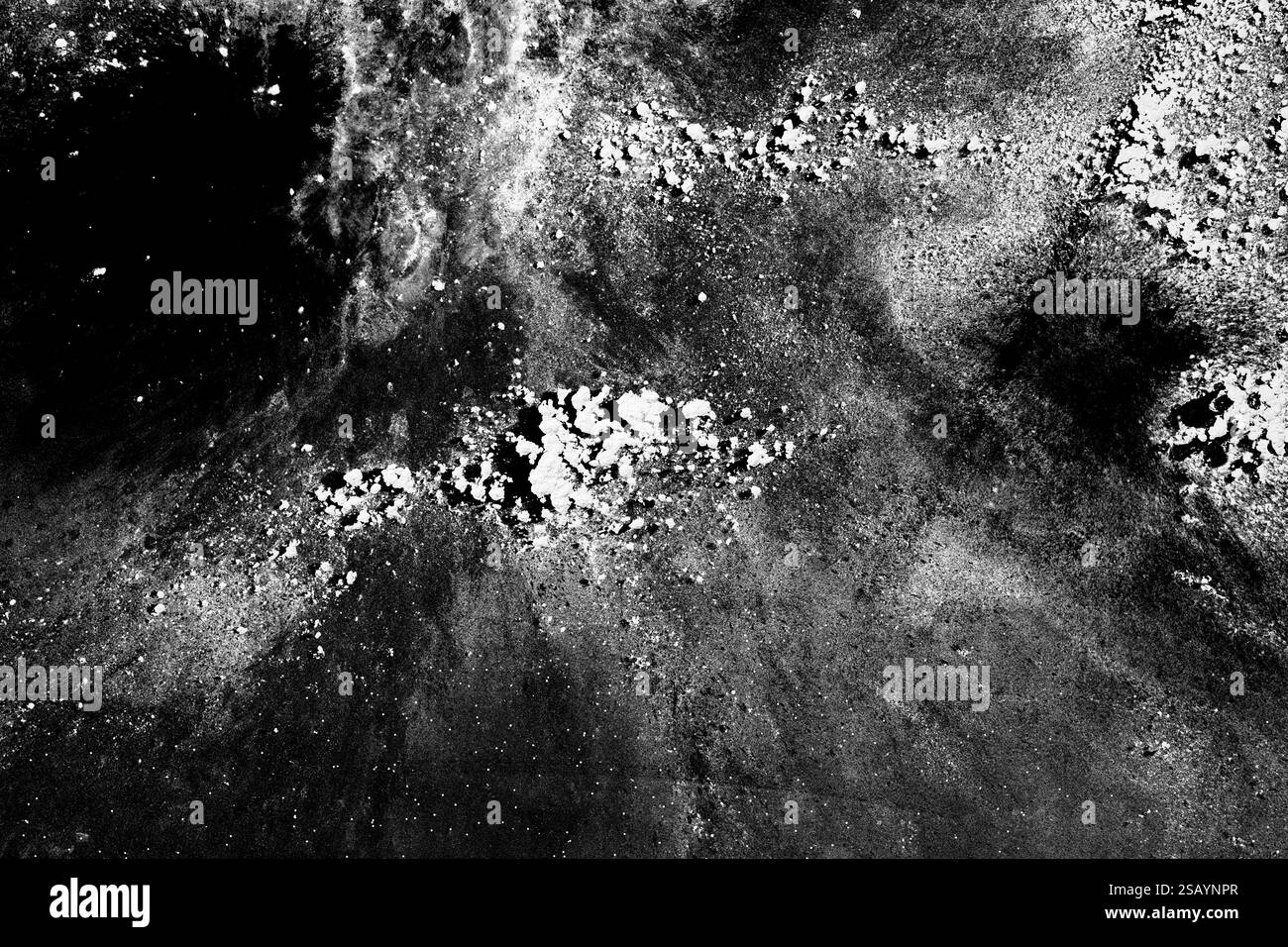 Detail of a fine white Holi flour powder granules dust cocaine drug ...