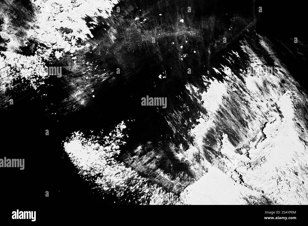 Detail of a fine white Holi flour powder granules dust cocaine drug ...