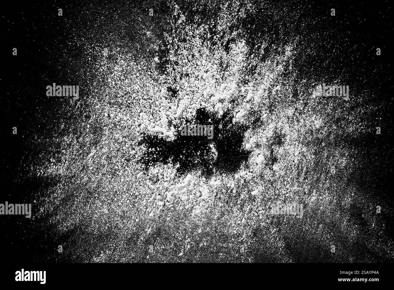 Detail of a fine white Holi flour powder granules dust cocaine drug ...