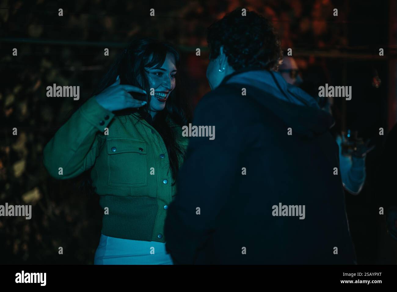 Multicultural Friends Enjoying a Social Gathering in a Relaxed Indoor ...