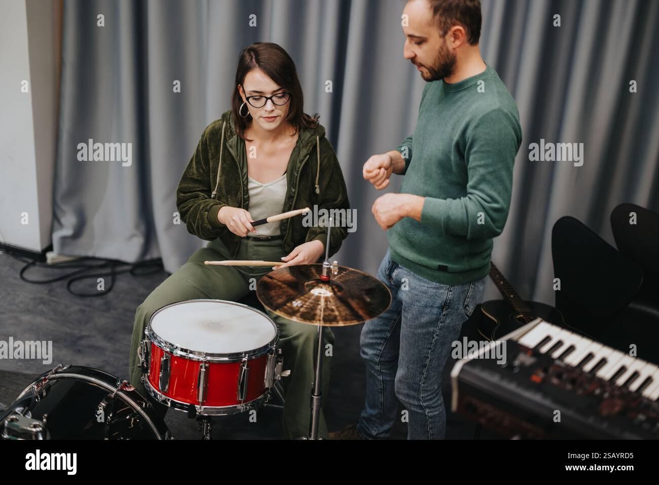 Drum lesson in a professional music studio with musical equipment Stock ...