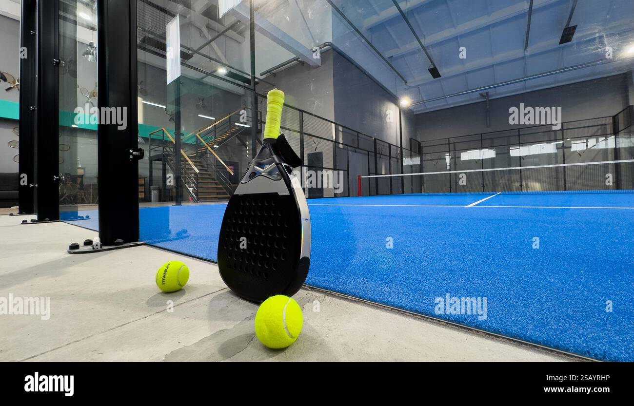 Padel tennis racket. Background with copy space. Sport court and balls ...