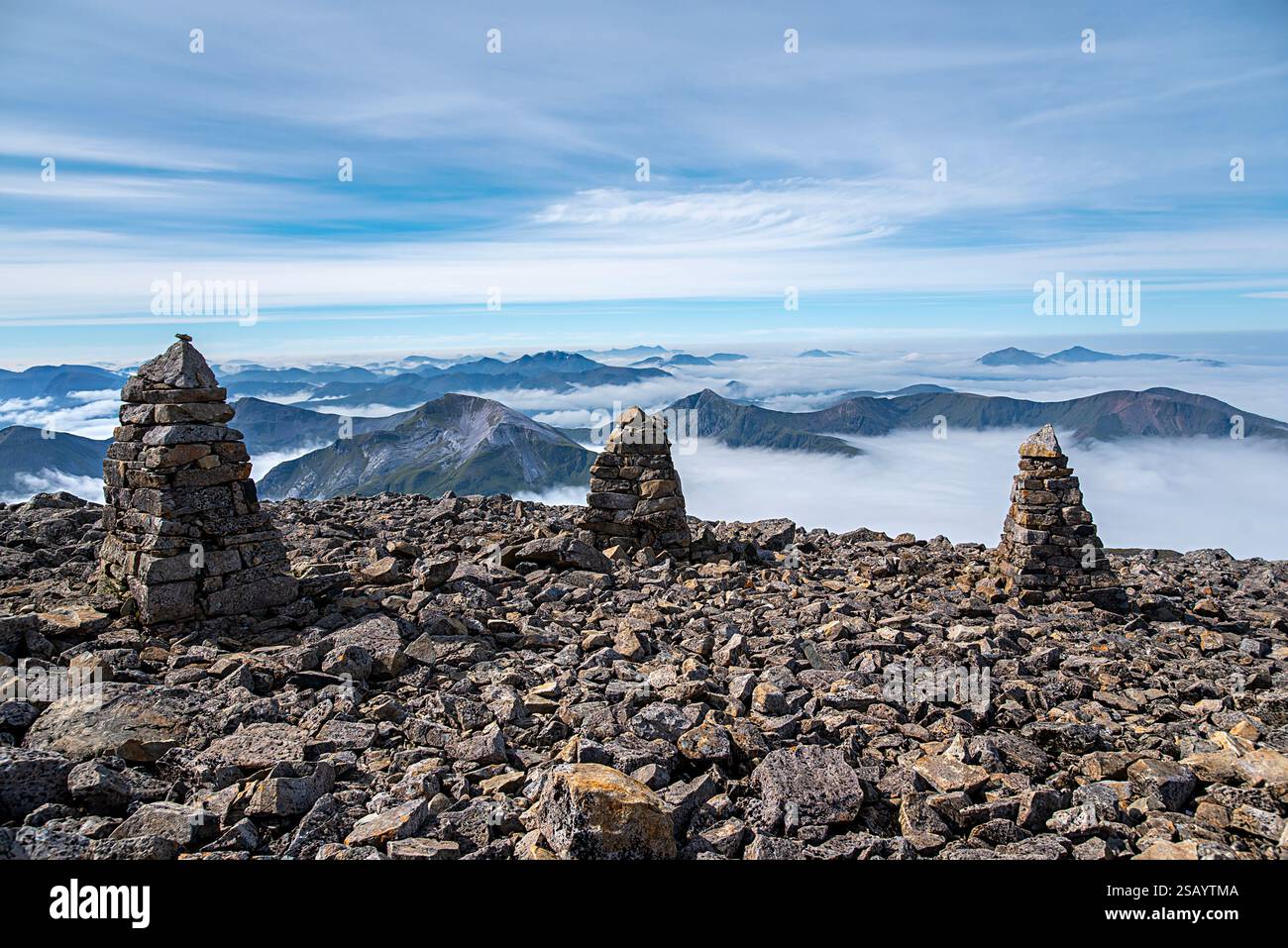 Landscape photography of mountains and stone pyramids, sky and clouds ...