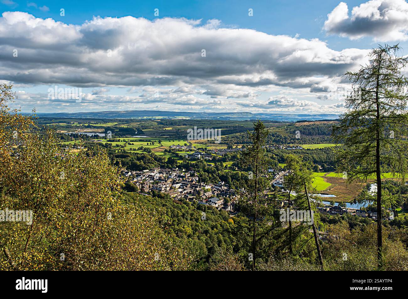 Landscape photography of valley and town Callander, Scotland, pasture ...
