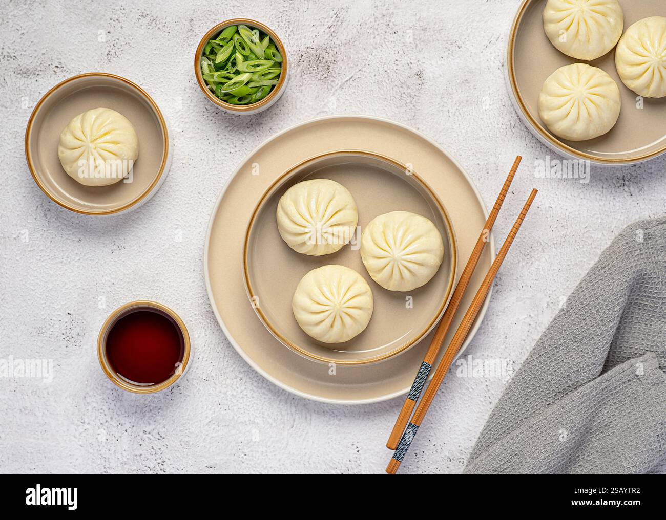 Food photography of steamed duck bao buns, spring onion, soy sauce ...