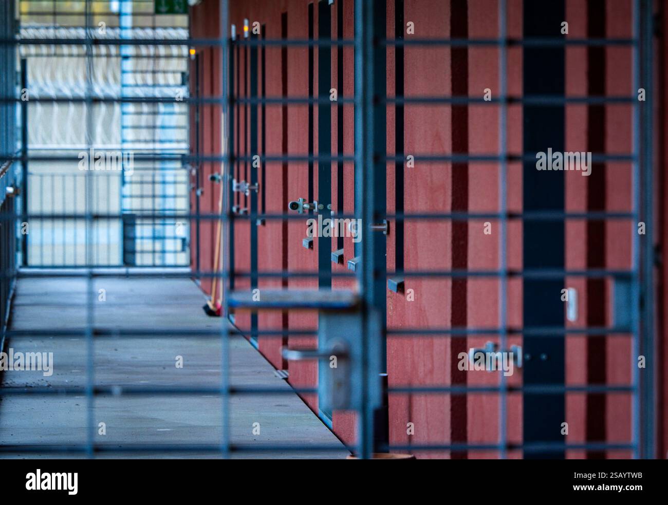 PRODUCTION - 31 January 2025, Mecklenburg-Western Pomerania, Bützow: A barred door secures ...