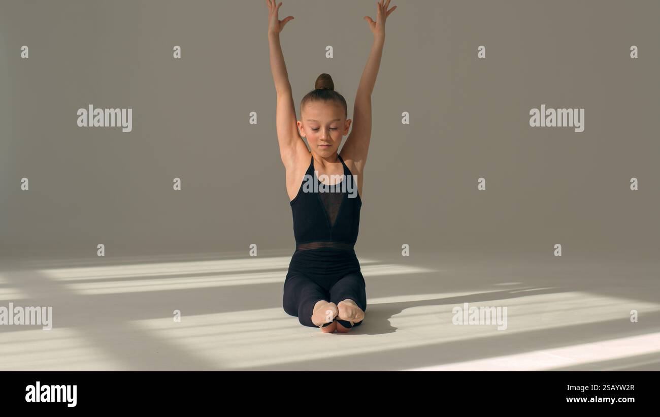 Caucasian sport girl little kid child daughter schoolgirl gymnast ...