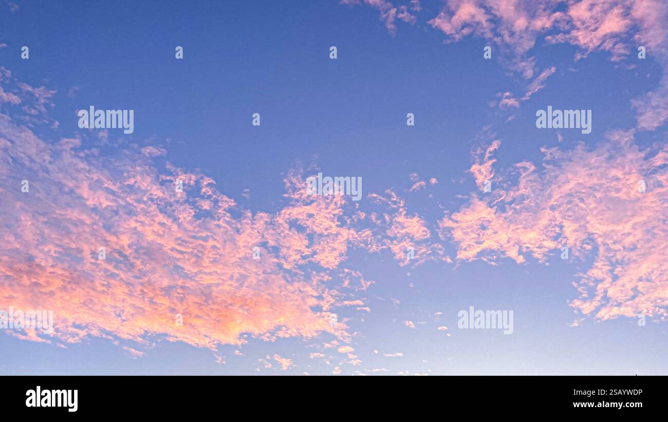 Cloudy blue pinkish sky Stock Photo - Alamy