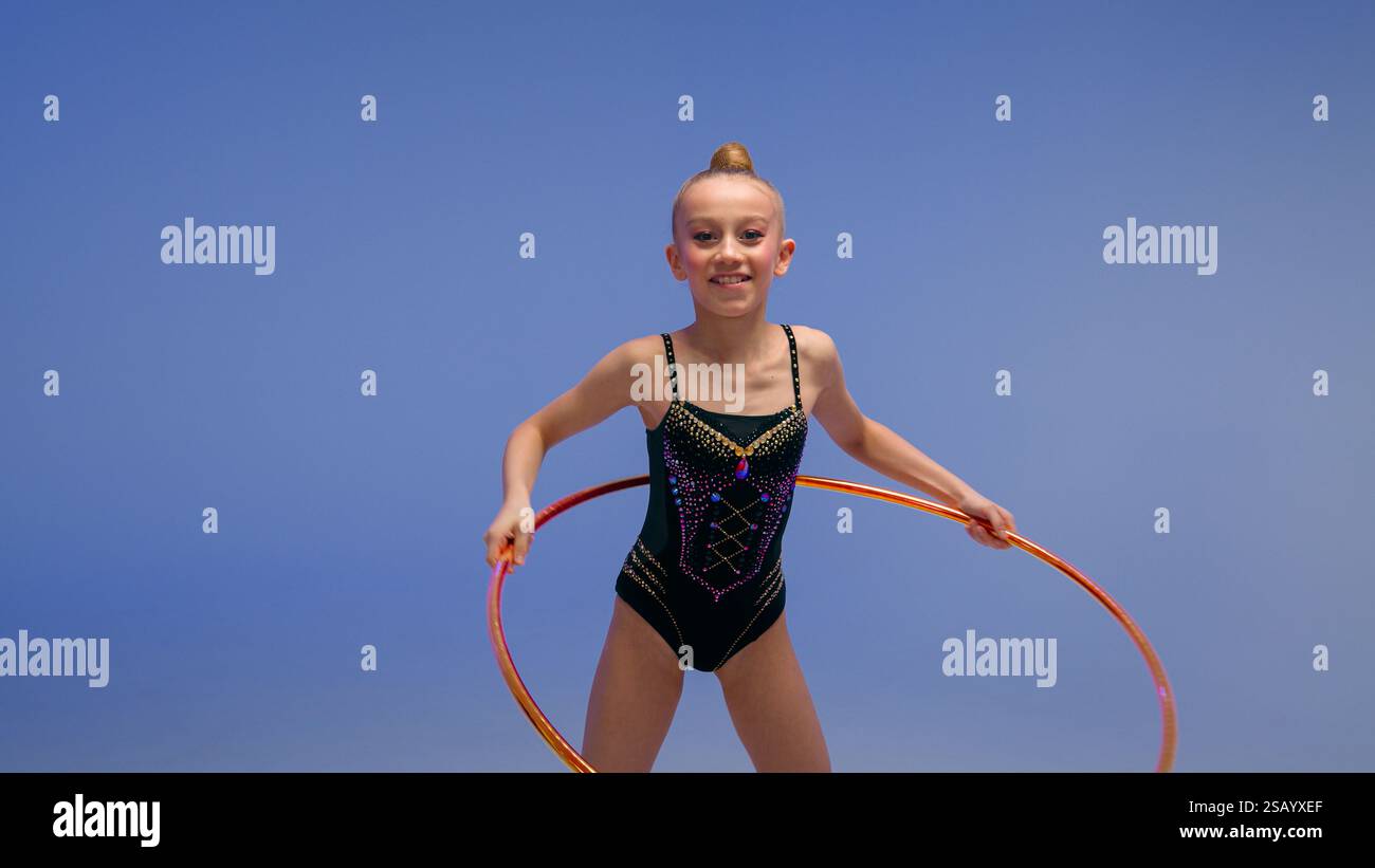 Caucasian little girl child kid daughter schoolgirl gymnast athlete ...