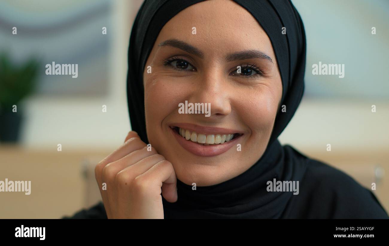 Close up portrait happy Arabian muslim Islamic woman in black hijab ...