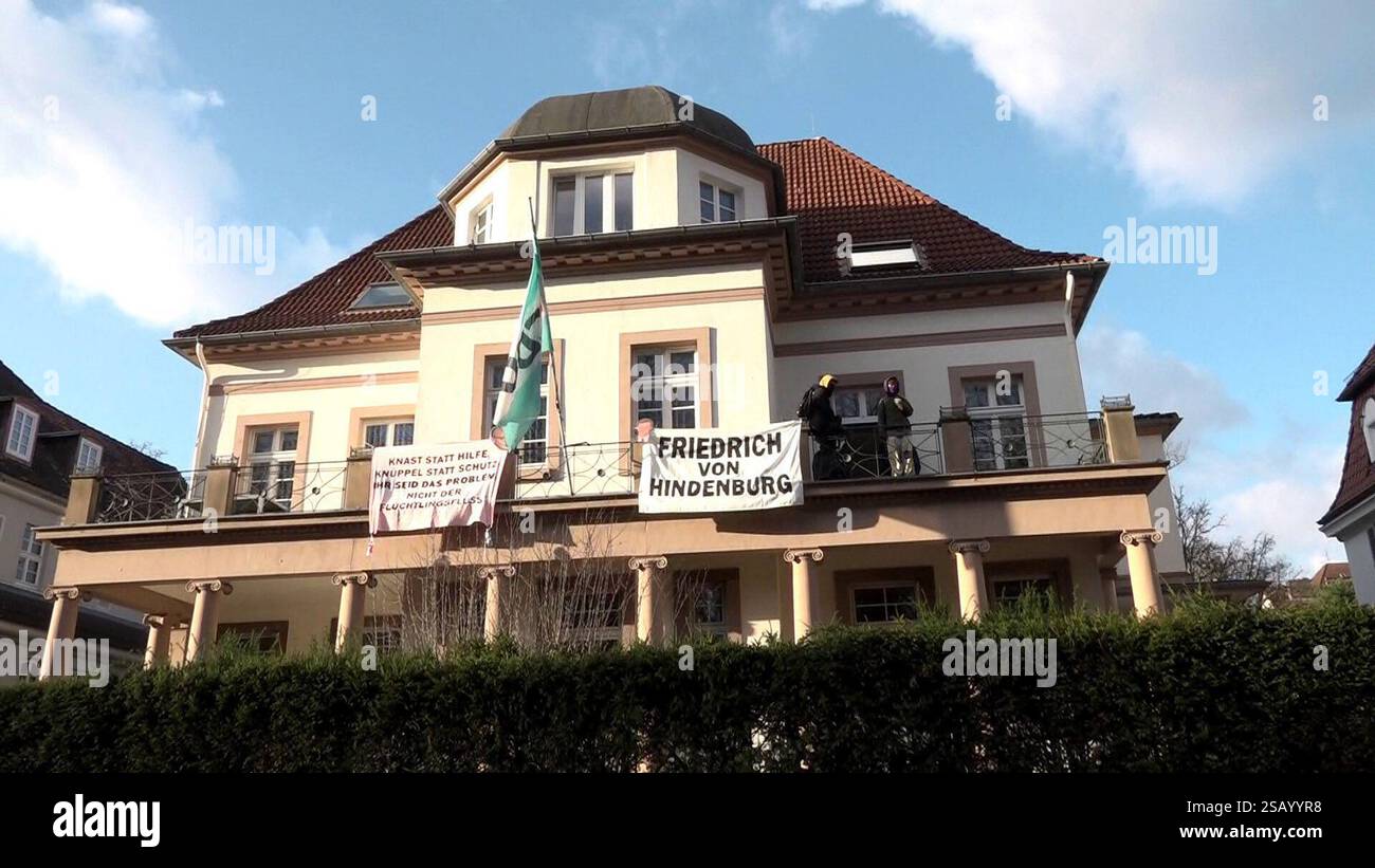 Hanover, Germany. 31st Jan, 2025. Activists climbed onto the balcony of ...
