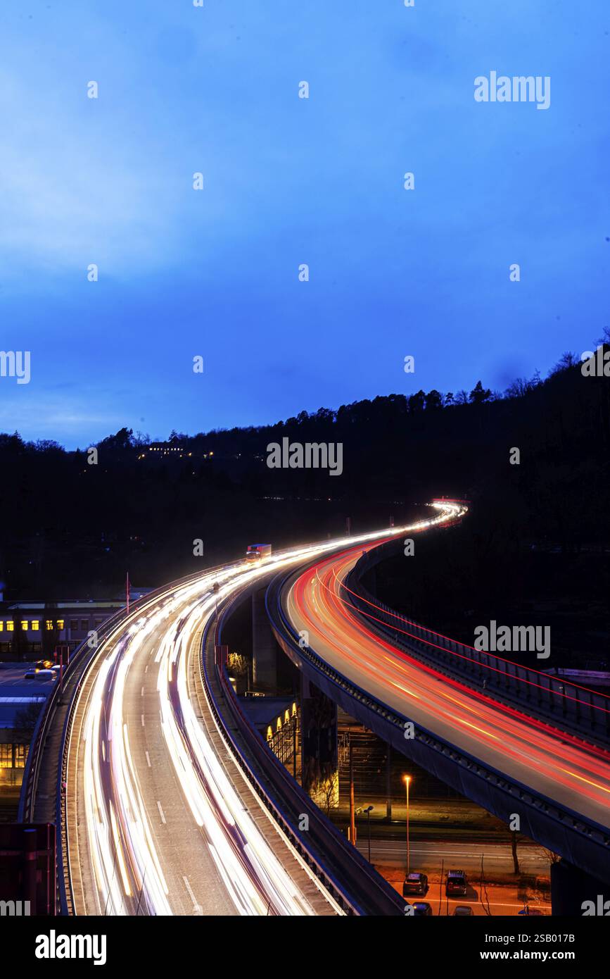 Federal road B14 in the evening, road bridge with traffic and light ...