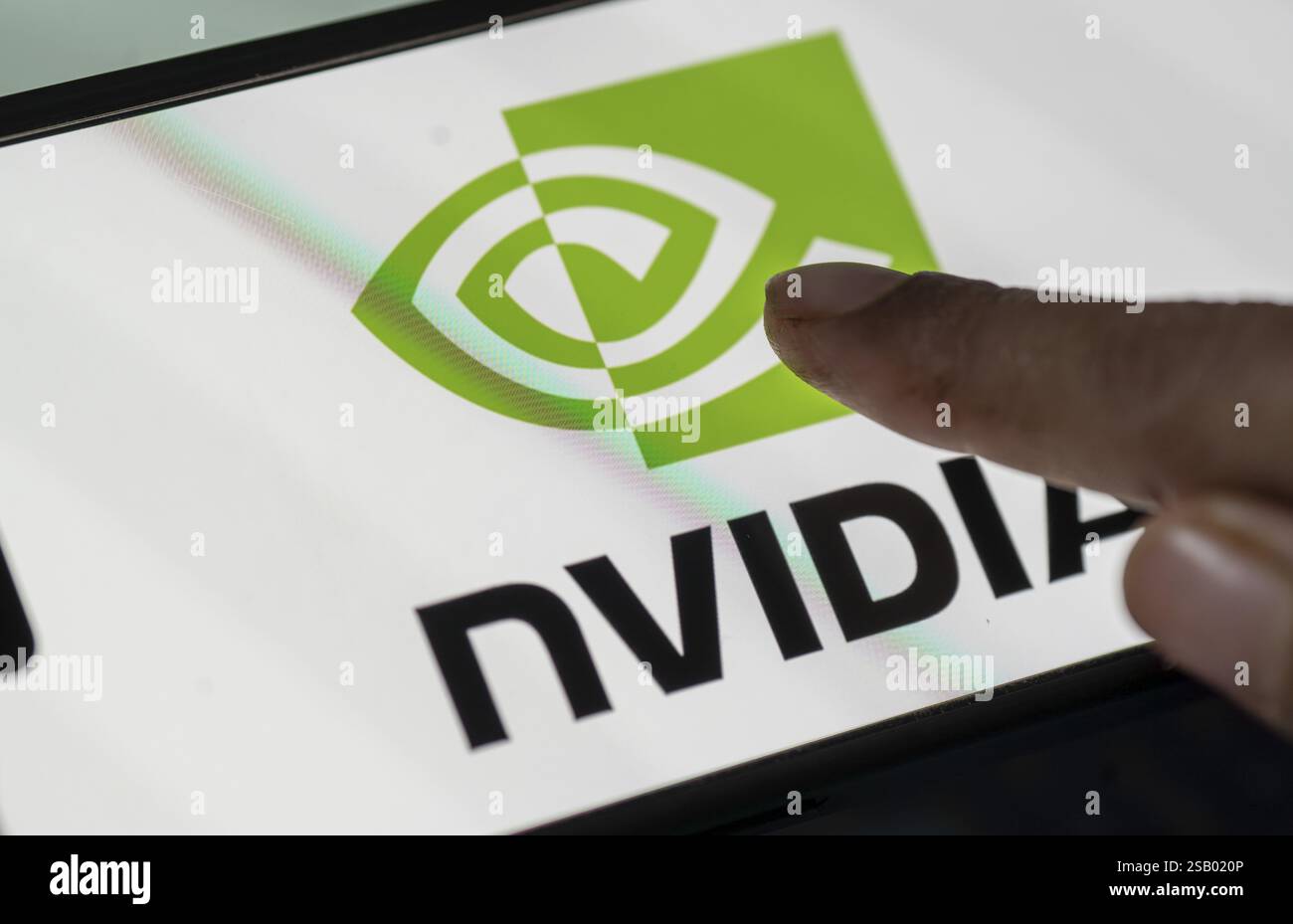 In this photo illustration, the Nvidia Corporation logo is displayed on ...