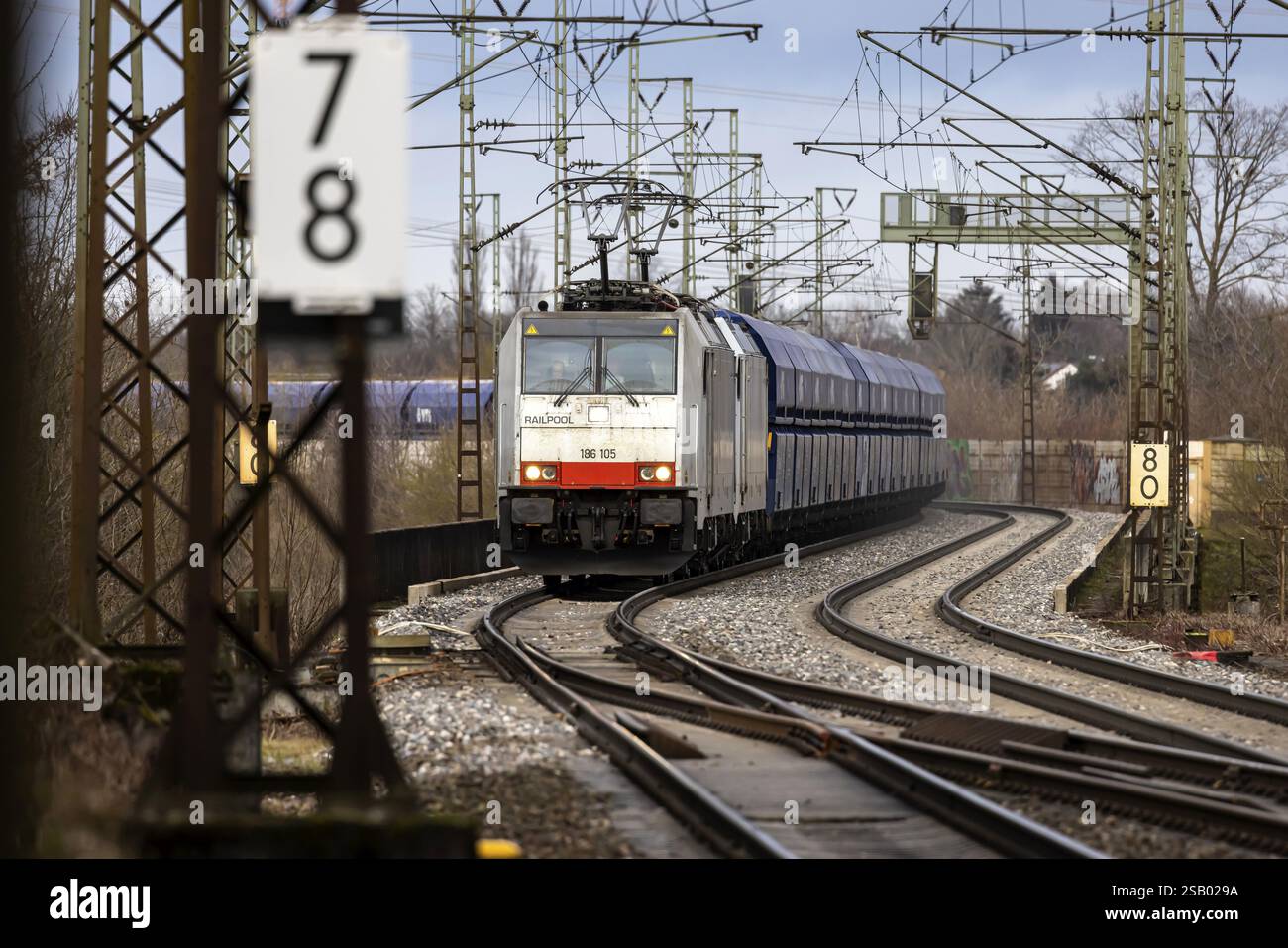 Goods train travelling on the winding Schuster Railway, overhead lines ...