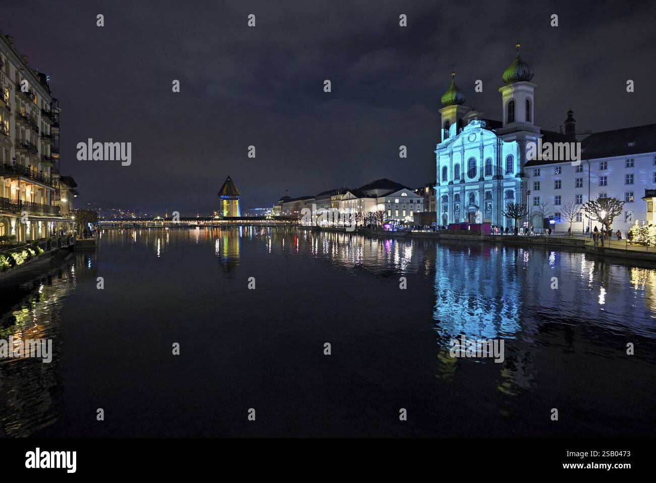 Water tower and Jesuit church on the right with light installation, on ...