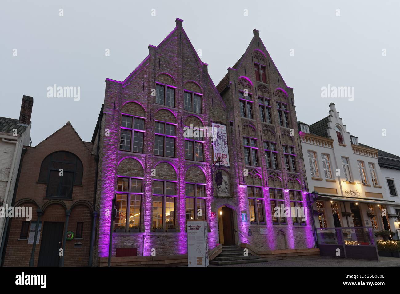 Medieval houses with illuminated facades, Eulenspiegel Museum, twilight ...