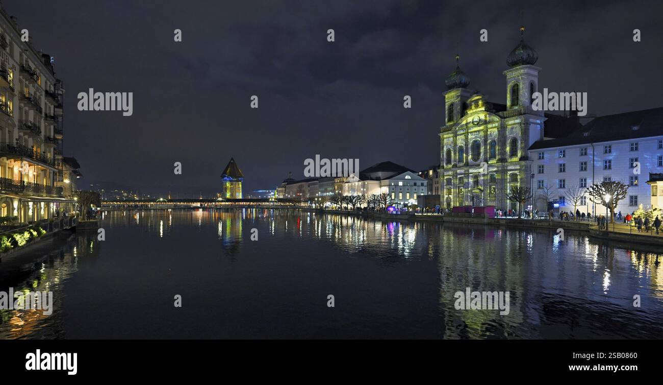 Water tower and Jesuit church on the right with light installation, on ...