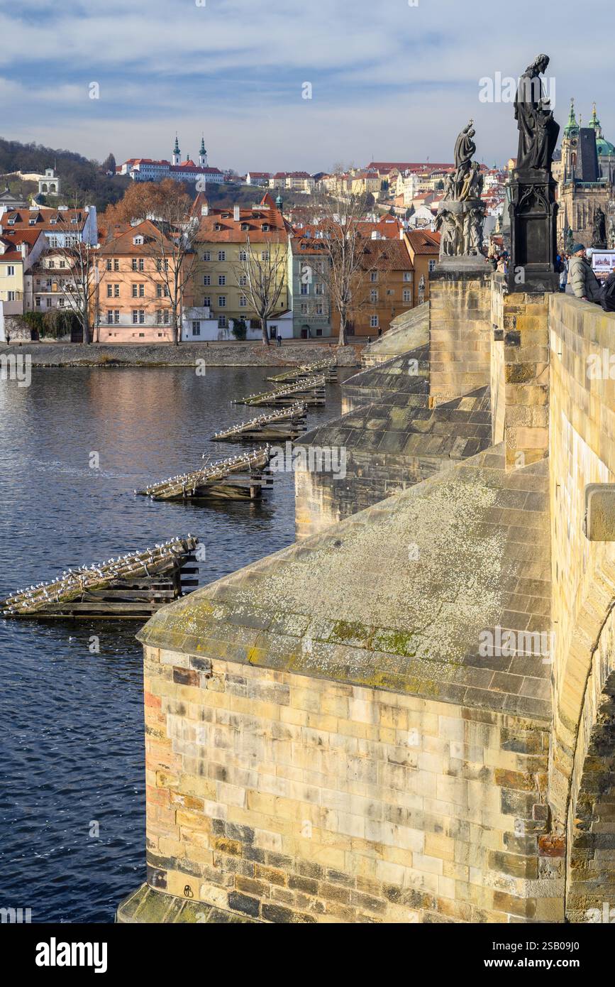 Charles Bridge over Vltava river in winter, in Prague, Czech Republic ...
