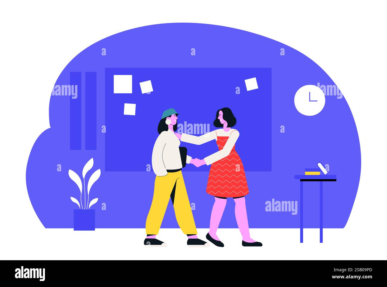 Two businesswomen shaking hands after reaching an agreement in a modern ...