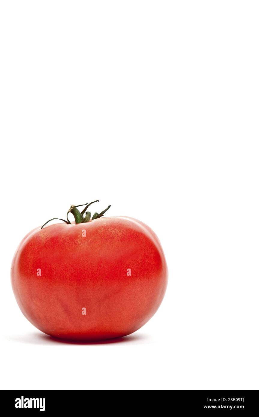 Beautiful red ripe tomato ready to be eaten Stock Photo - Alamy