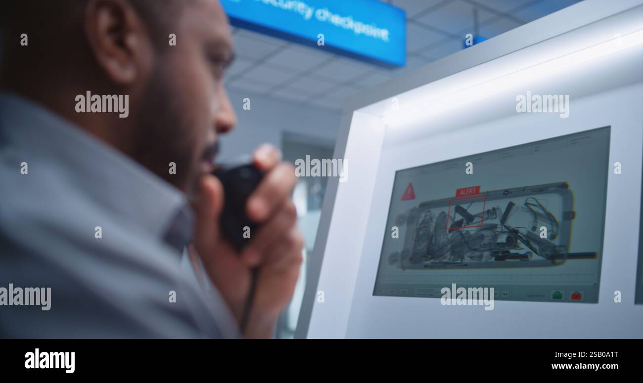 Airport Terminal: African American Security Officer Monitors X-ray ...