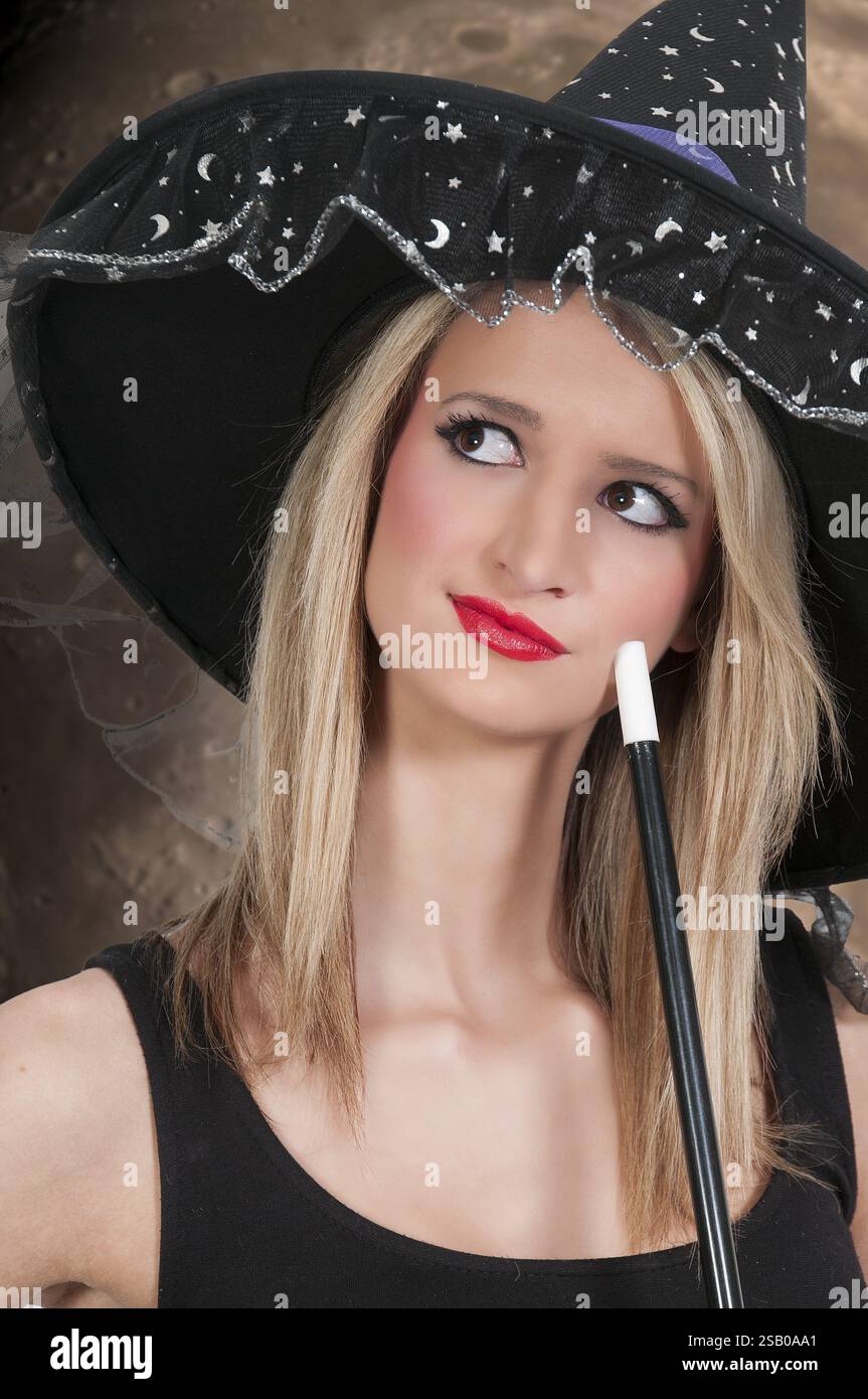 Beautiful woman wicked witch with ruby shoes Stock Photo - Alamy