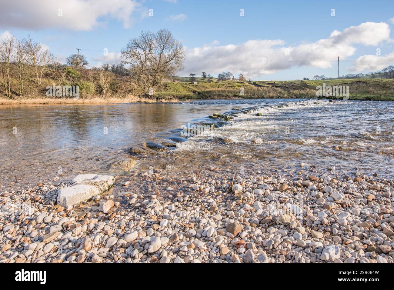 Stepping stones below Linton Falls and leading across the River Wharfe ...