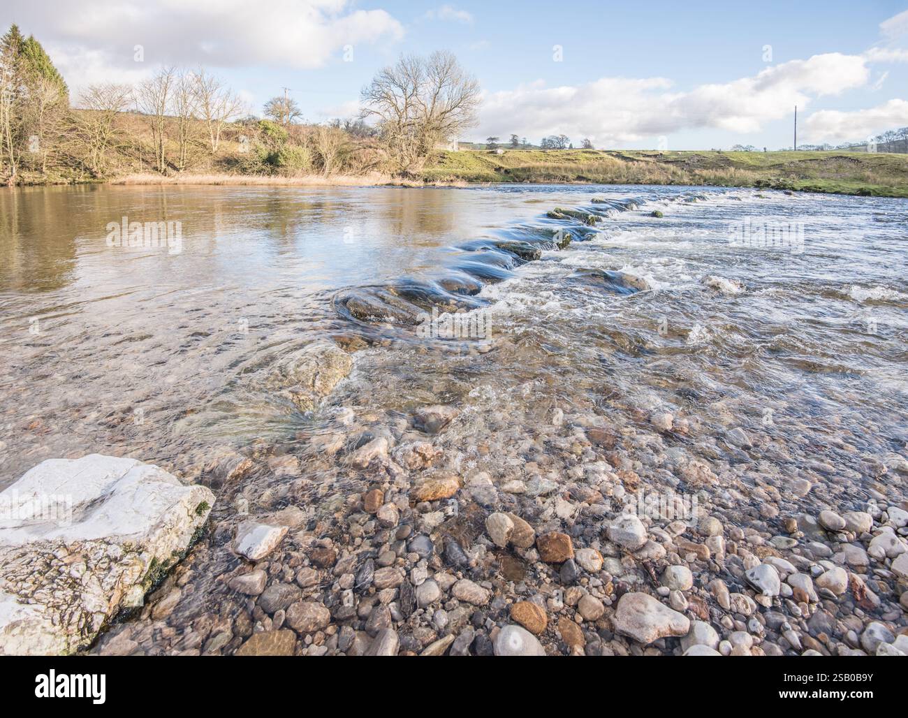 Stepping stones below Linton Falls and leading across the River Wharfe ...