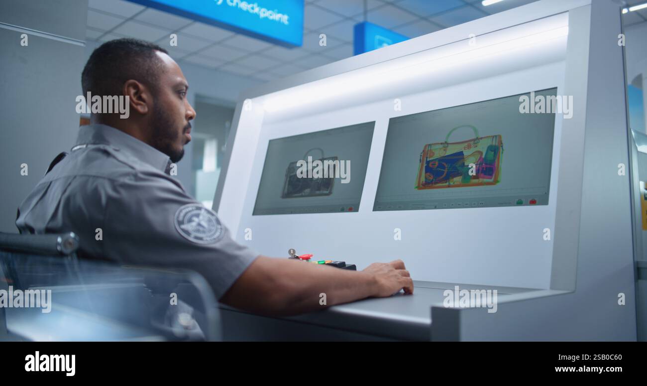 African American Security Officer Controls Luggage Screening on ...