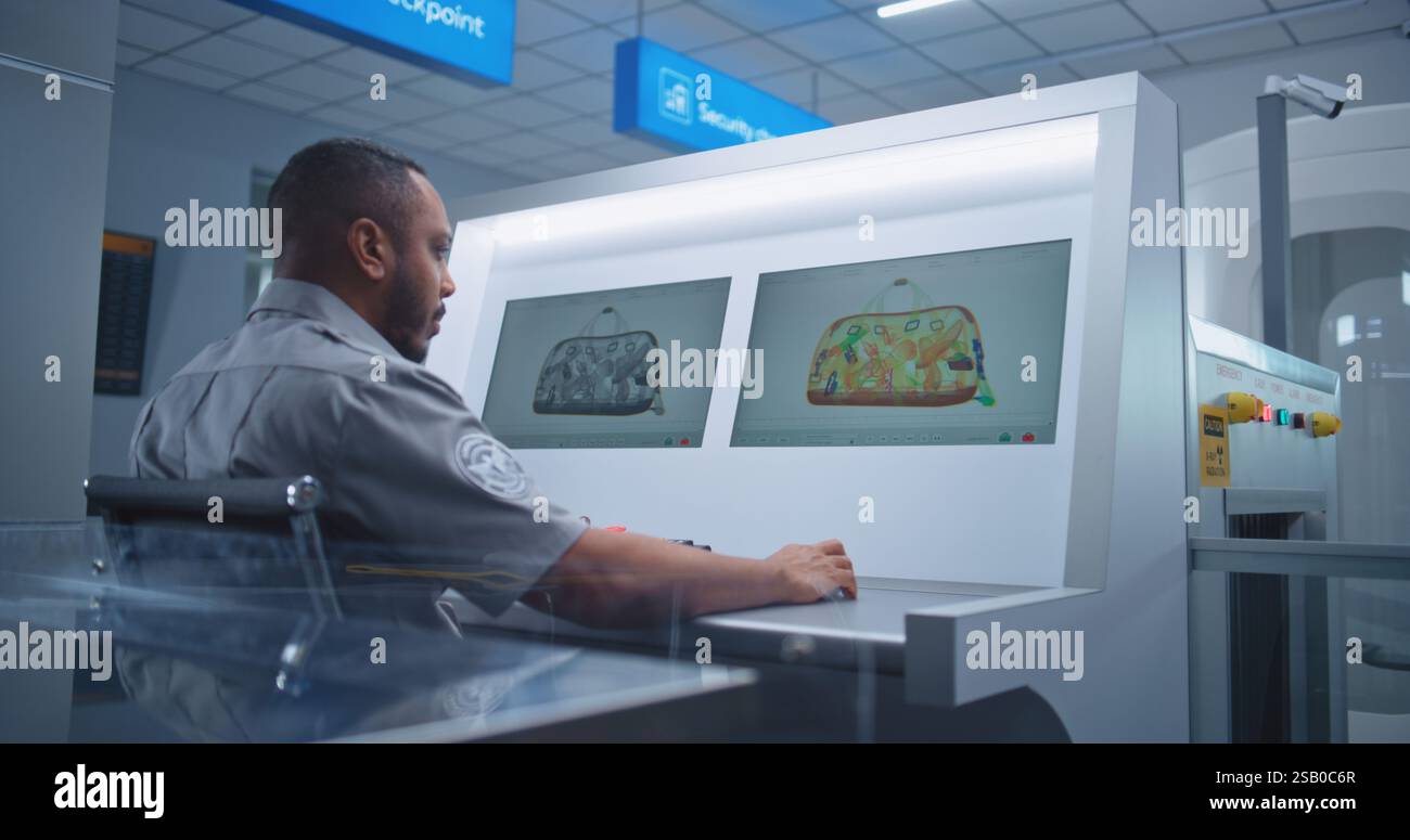 African American Security Officer Controls Luggage Screening on ...