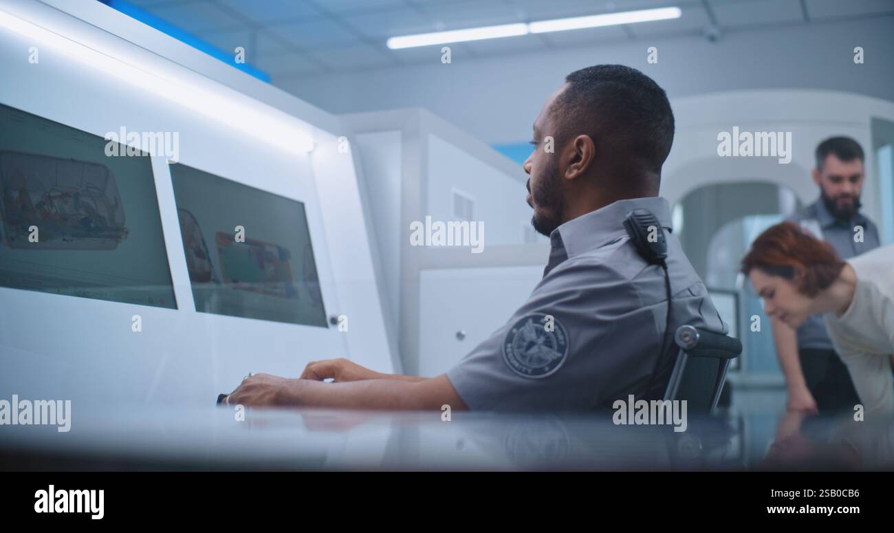 Airport Security Checkpoint: African American Security Officer Monitors ...
