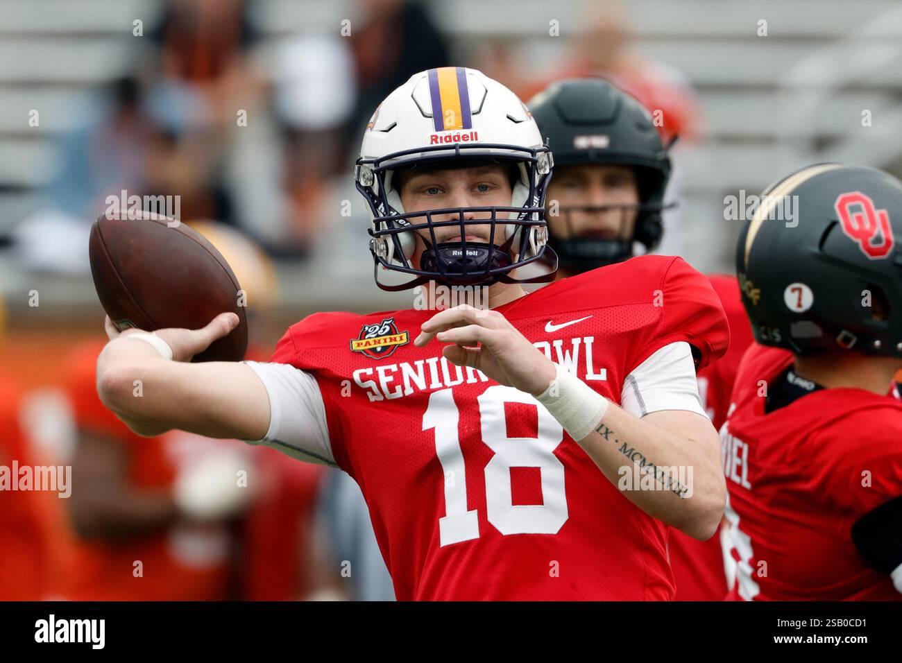 National team quarterback Taylor Elgersma of Laurier (18) runs through ...
