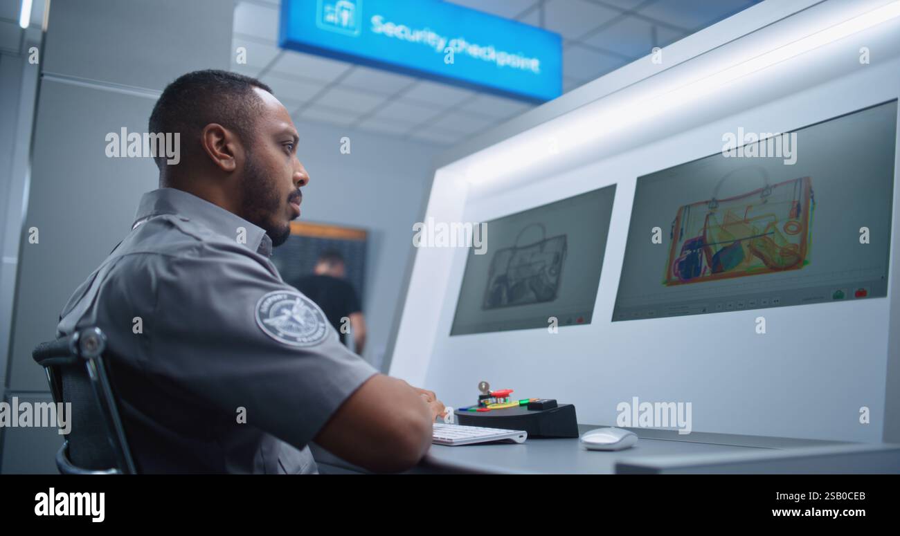 African American Security Officer Controls Luggage Screening on ...