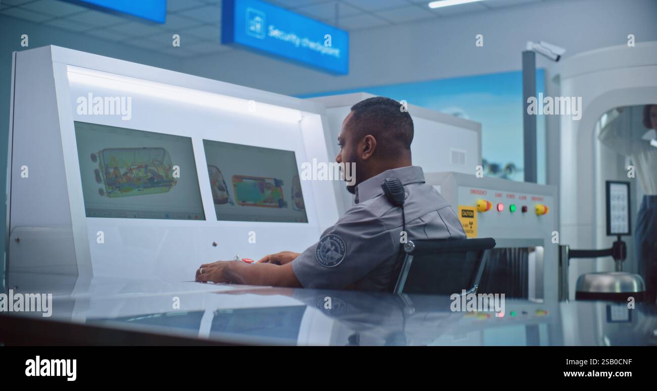 African American Security Officer Controls Luggage Screening on ...