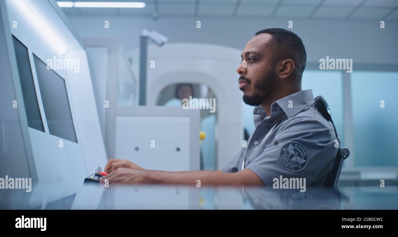 Airport Security Checkpoint: African American Security Officer Monitors ...