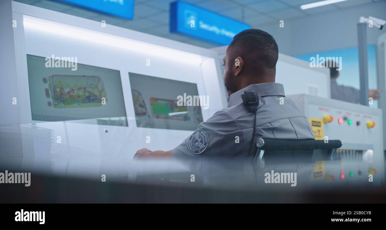 Airport Terminal: African American Security Officer Monitors Baggage ...