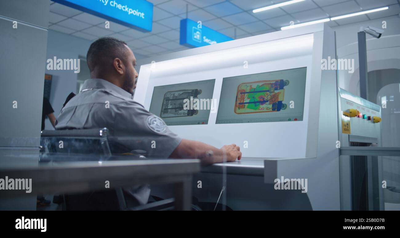 African American Security Officer Controls Luggage Screening on ...