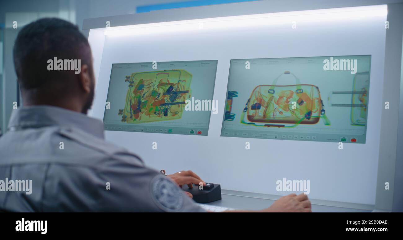 African American Security Officer Controls Luggage Screening on ...