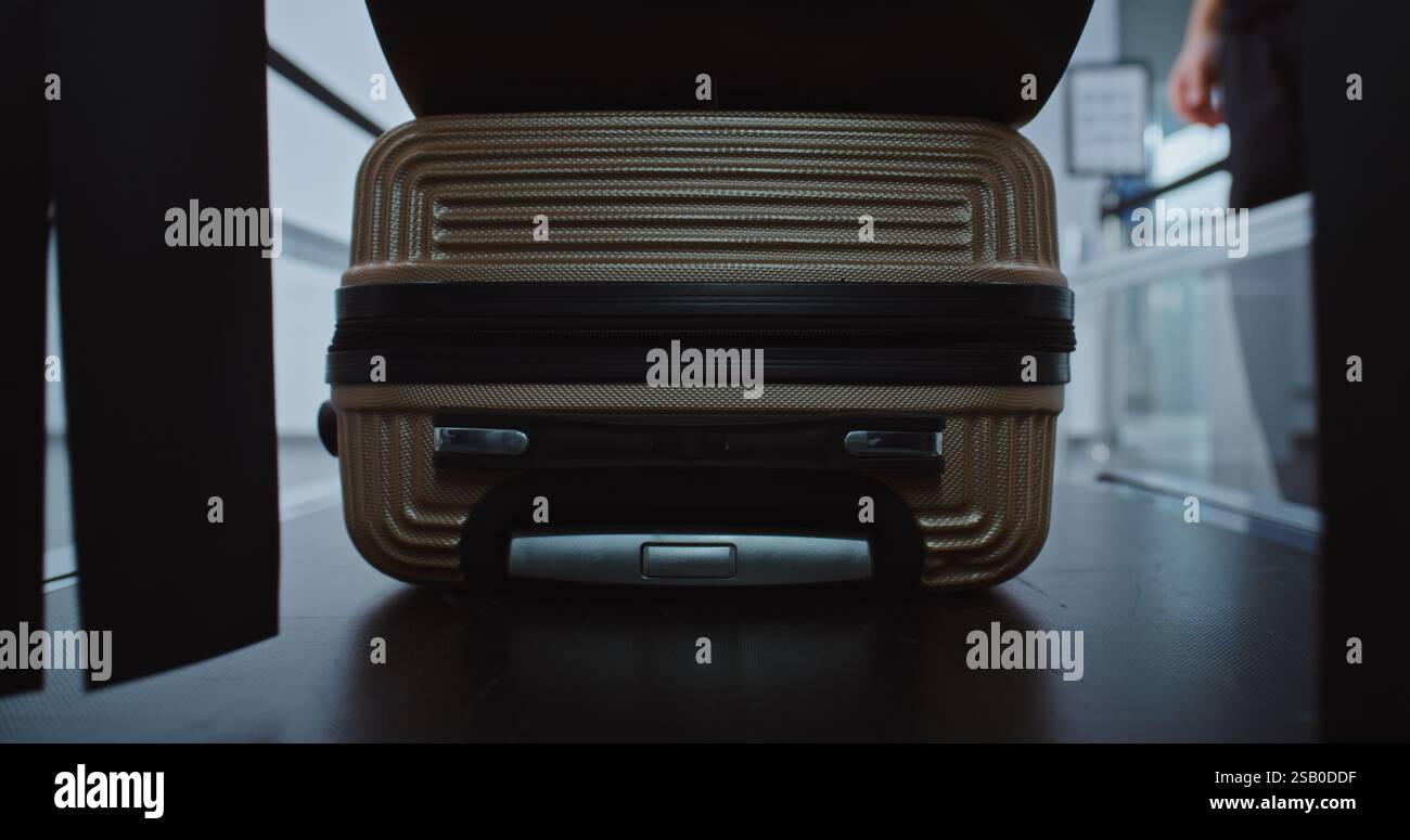 Airport Security Checkpoint: Close Up of Suitcase Moving on Conveyor ...