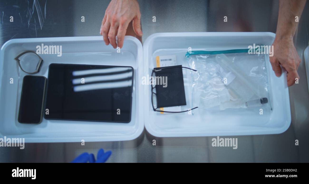 Top View on Passengers Placing Personal Items in Plastic Tray for ...
