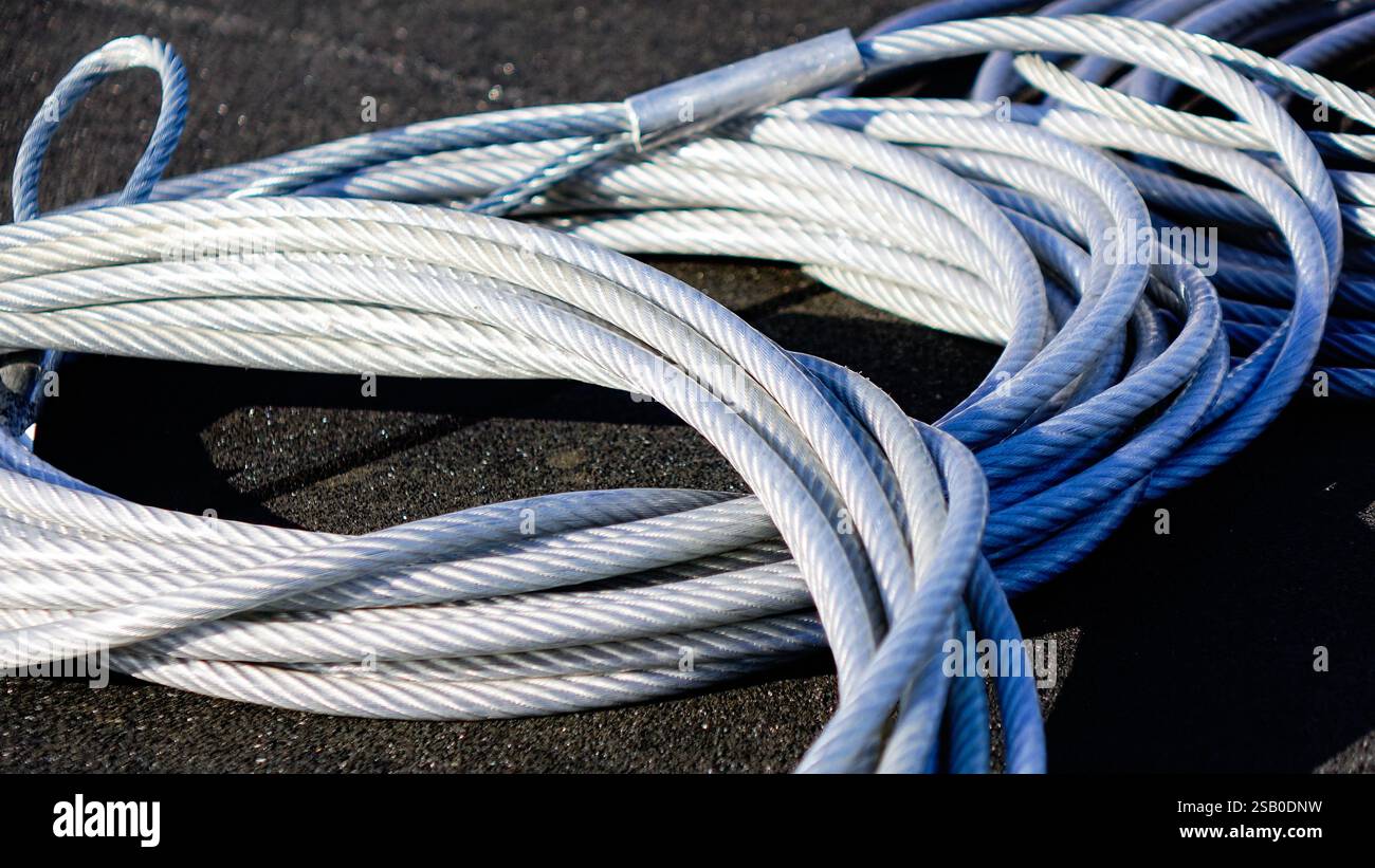rolled steel wire rope at construction site Stock Photo - Alamy