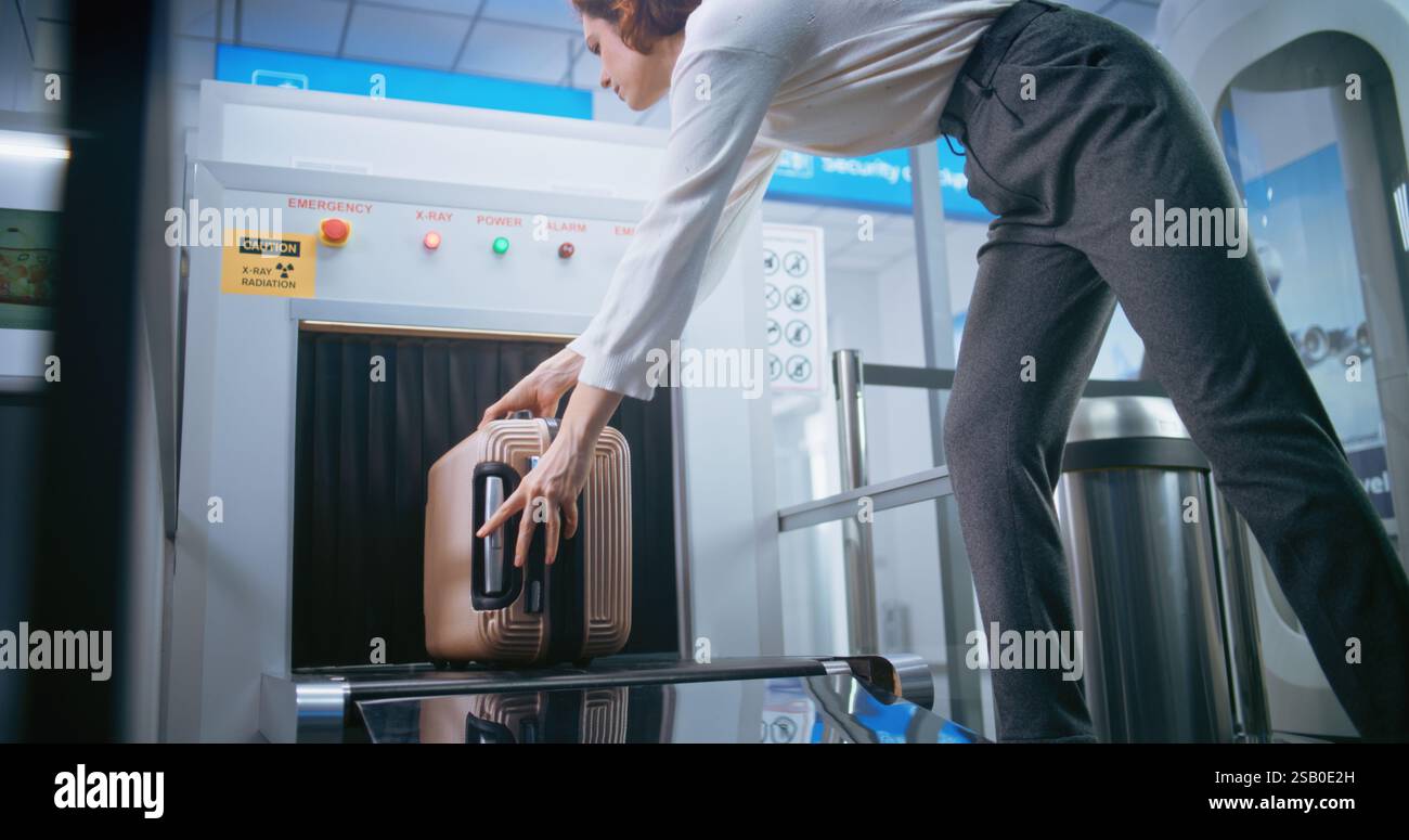 Airport Security Checkpoint: Passenger Places Suitcase on X-ray ...