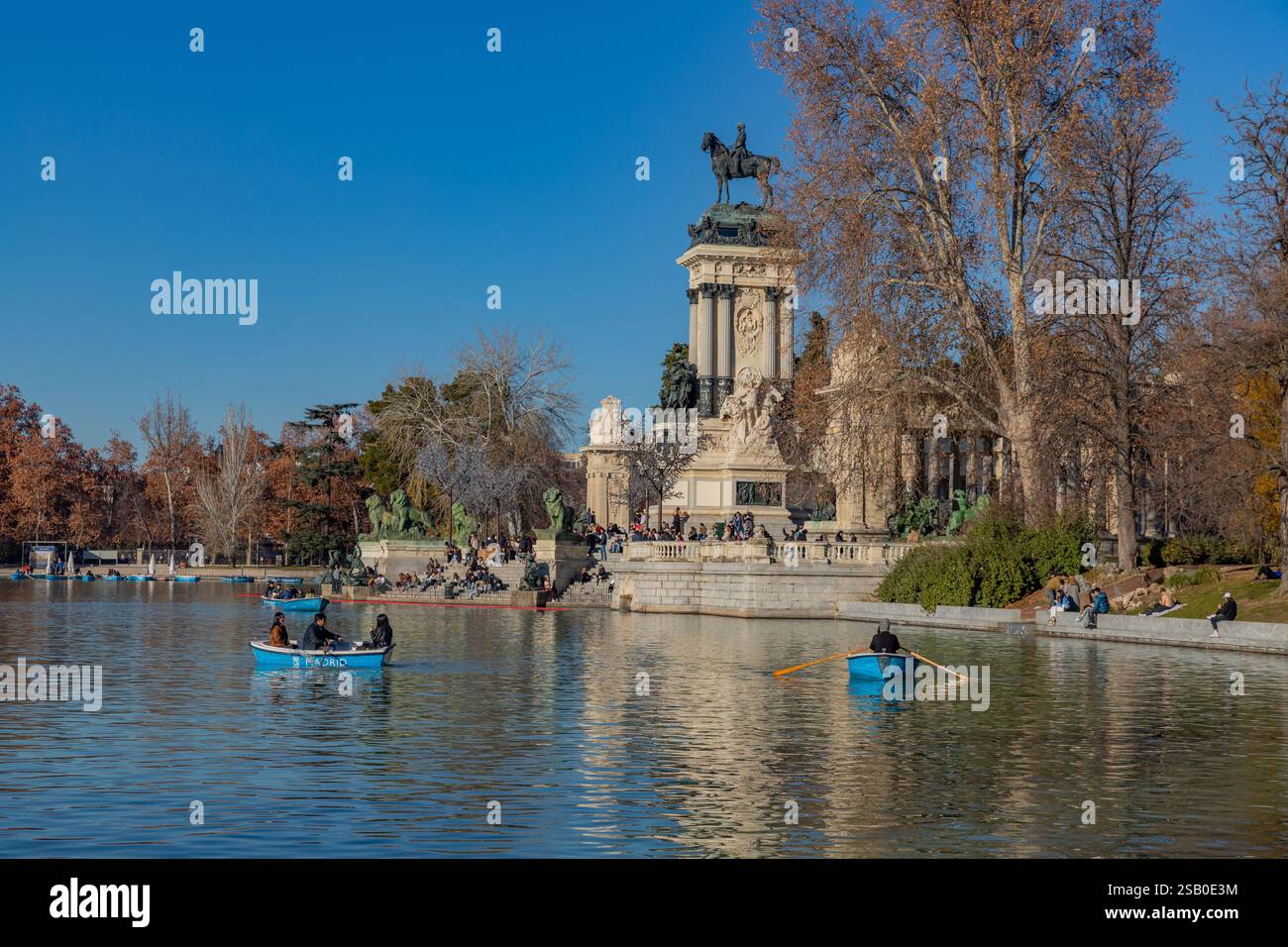 Madrid, Spain - December 21, 2024: People enjoying a boat ride on the ...