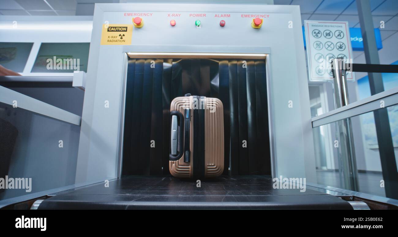 Security Check in Airport Terminal: Passenger Places Suitcase on ...