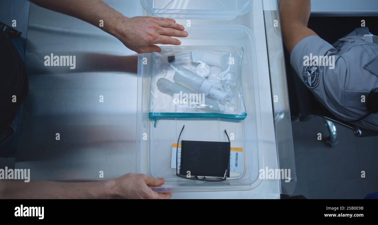 Top View on Passengers Placing Personal Items in Plastic Tray for ...