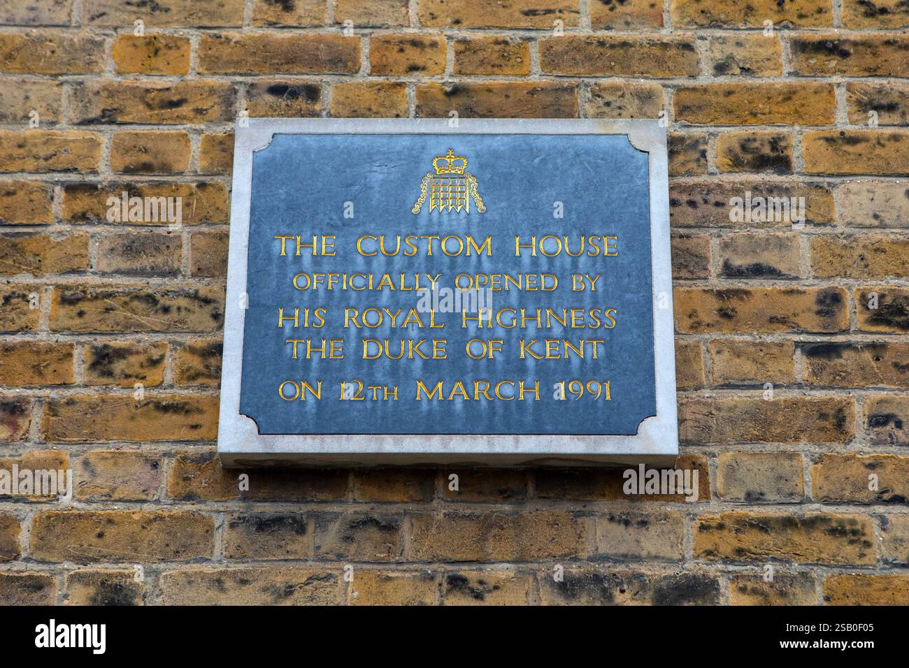Kent, UK - June 9th 2024: Close-up of a plaque on the historic Customs ...