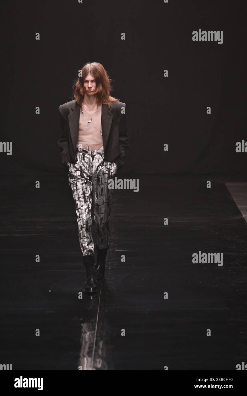 BERLIN, GERMANY - January 31: A model walks the runway during the Danny ...