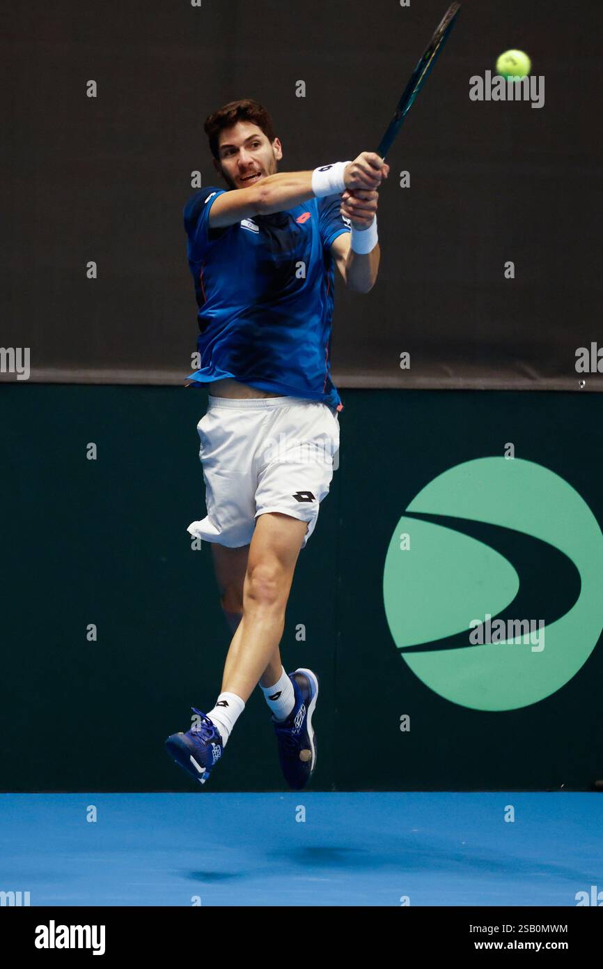 Yshai Oliel of Israel returns the ball to Maximilian Marterer of Germany during the Davis Cup ...