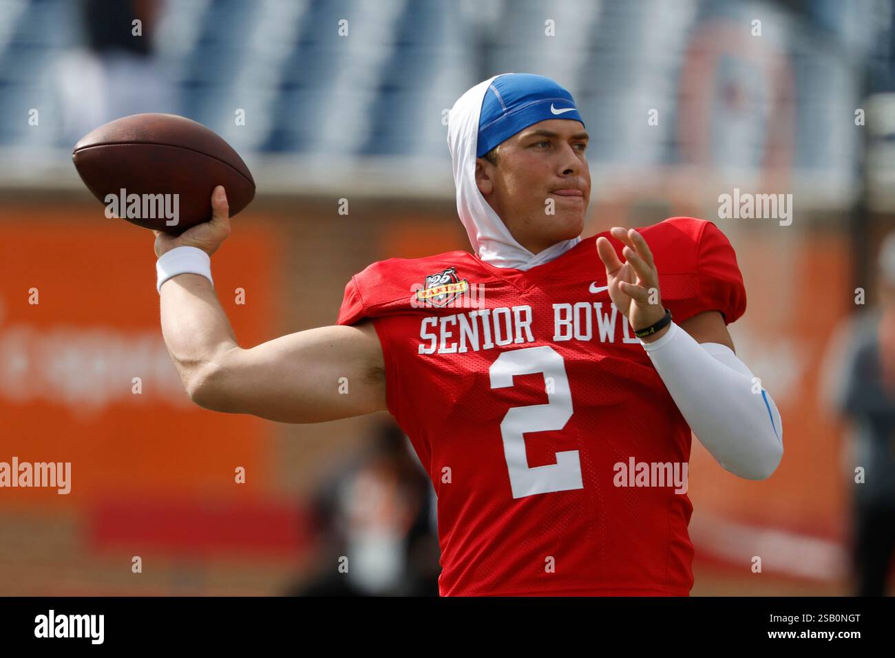 American team quarterback Jaxson Dart of Mississippi (2) runs through ...