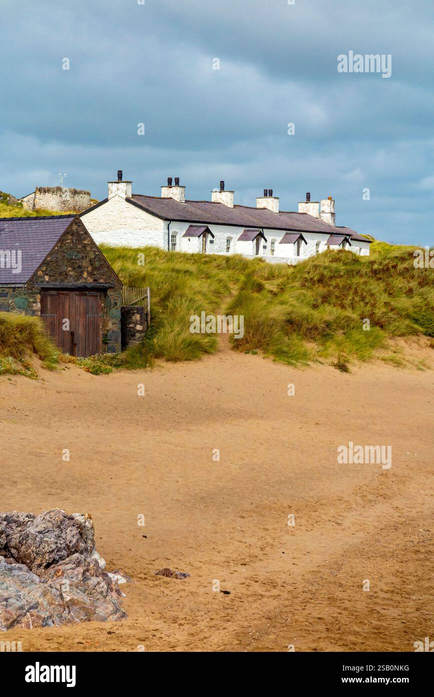 Traditional white painted cottages on the island of Ynys Llanddwyn off ...